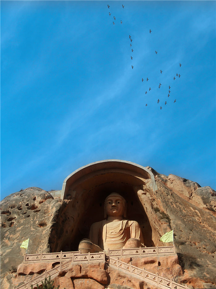Culture｜Photographer spends years documenting Chinese grotto art